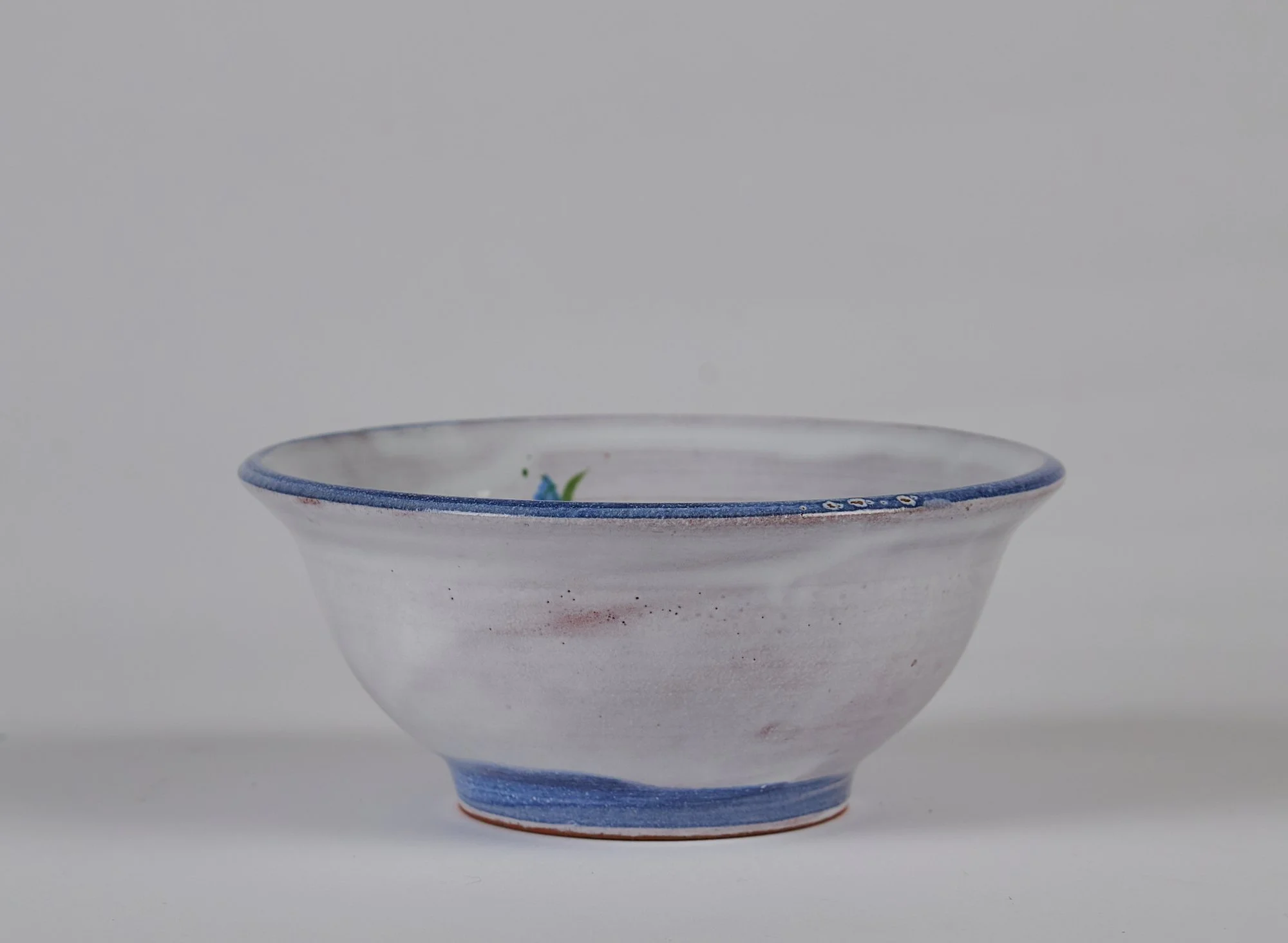 Small Ceramic Bowl with Blue Flower Design — Gillshaw Pottery in Sussex