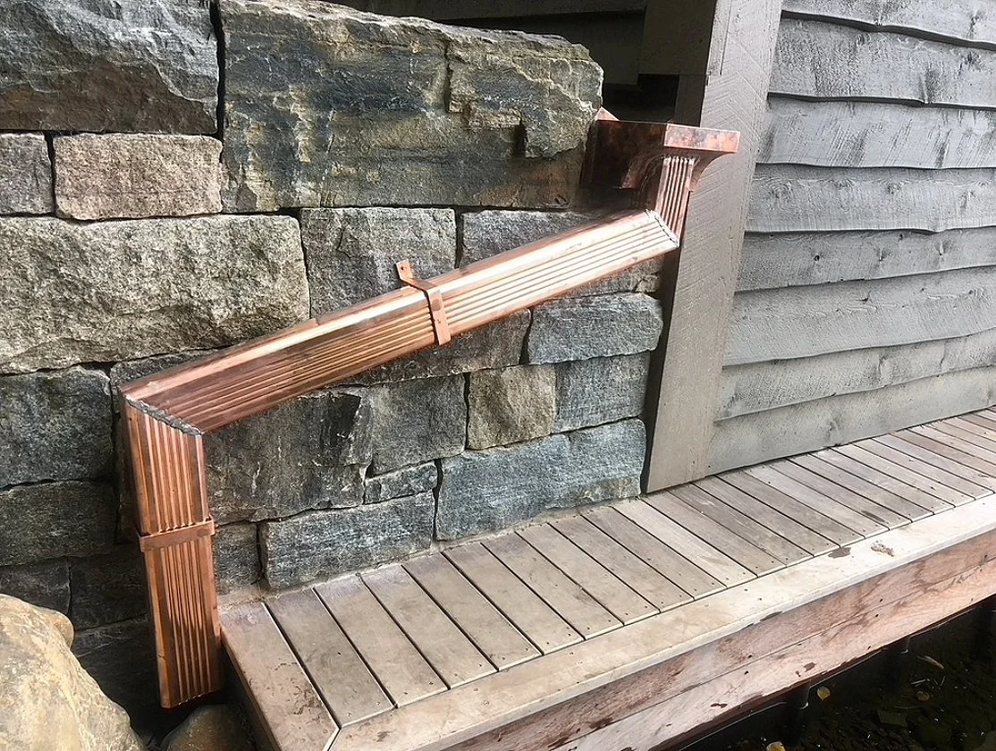 Gutters — Haas Stone & Steel