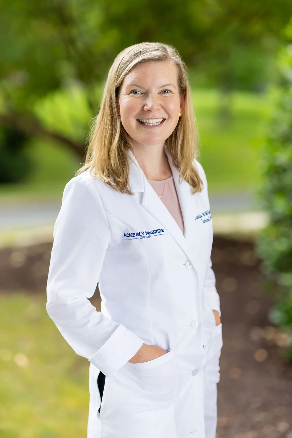 Dr. Louisa Whitesides — Ackerly McBride Group