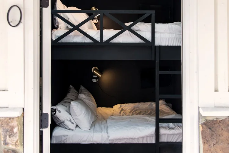 ROOMS — OUTPOST INN