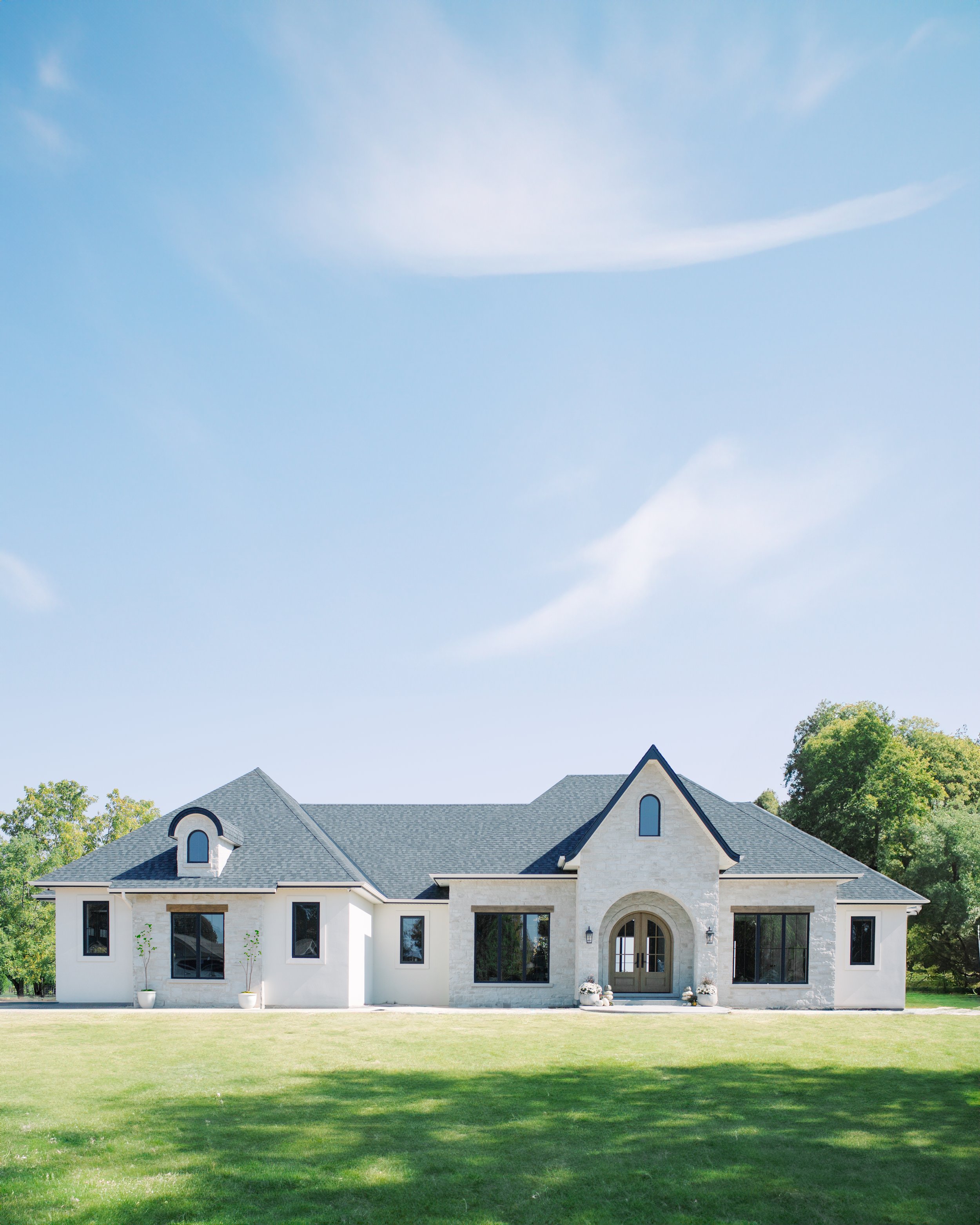 ARCH WOOD MANOR — Everest Estate Homes