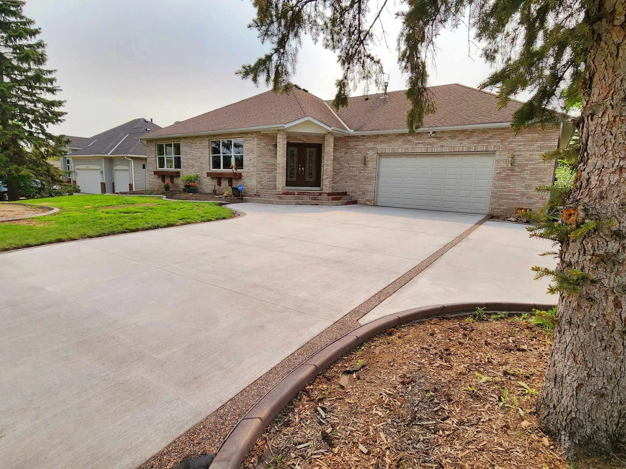 Residential Concrete Driveways Twin Cities — JW Concrete Solutions