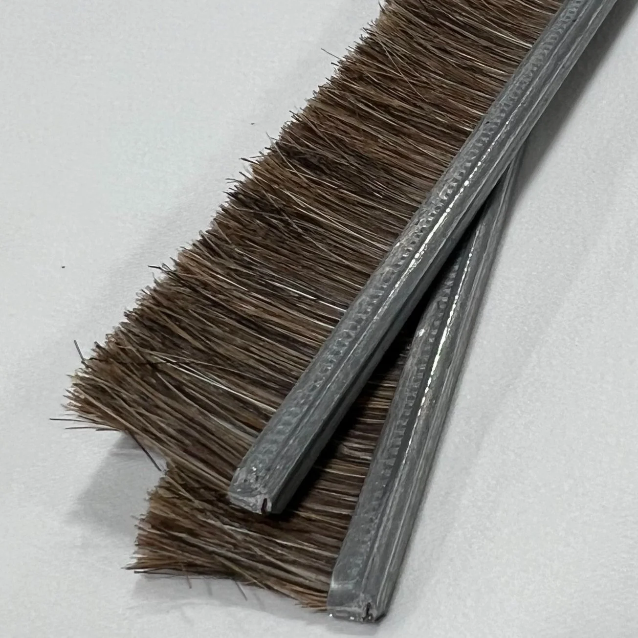 Metal Channel Strip Brush — Heartland Brush Company | Industrial Brush ...
