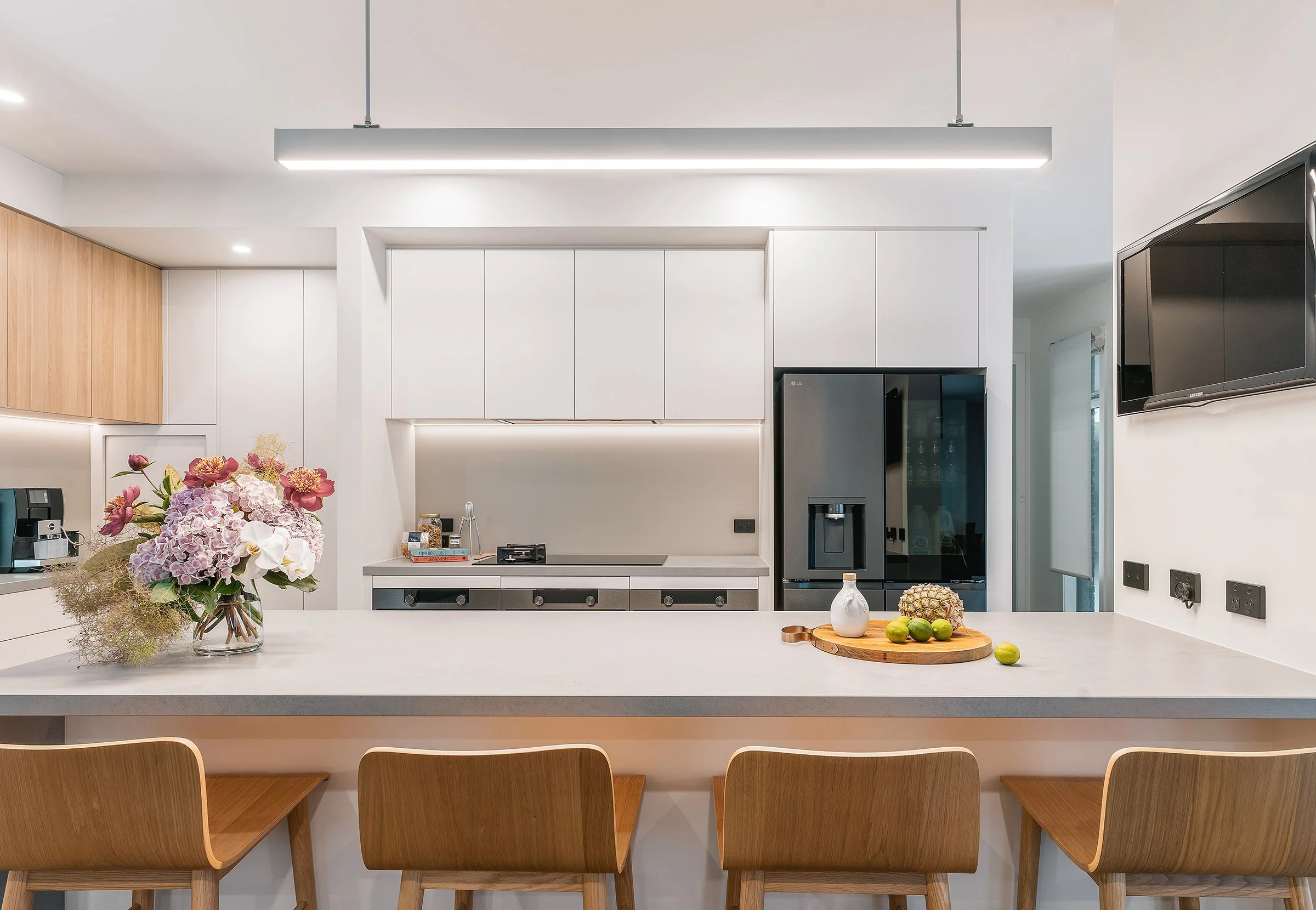 Modern Minimal Kitchen with white cabinetry and Kitchen Island with ...