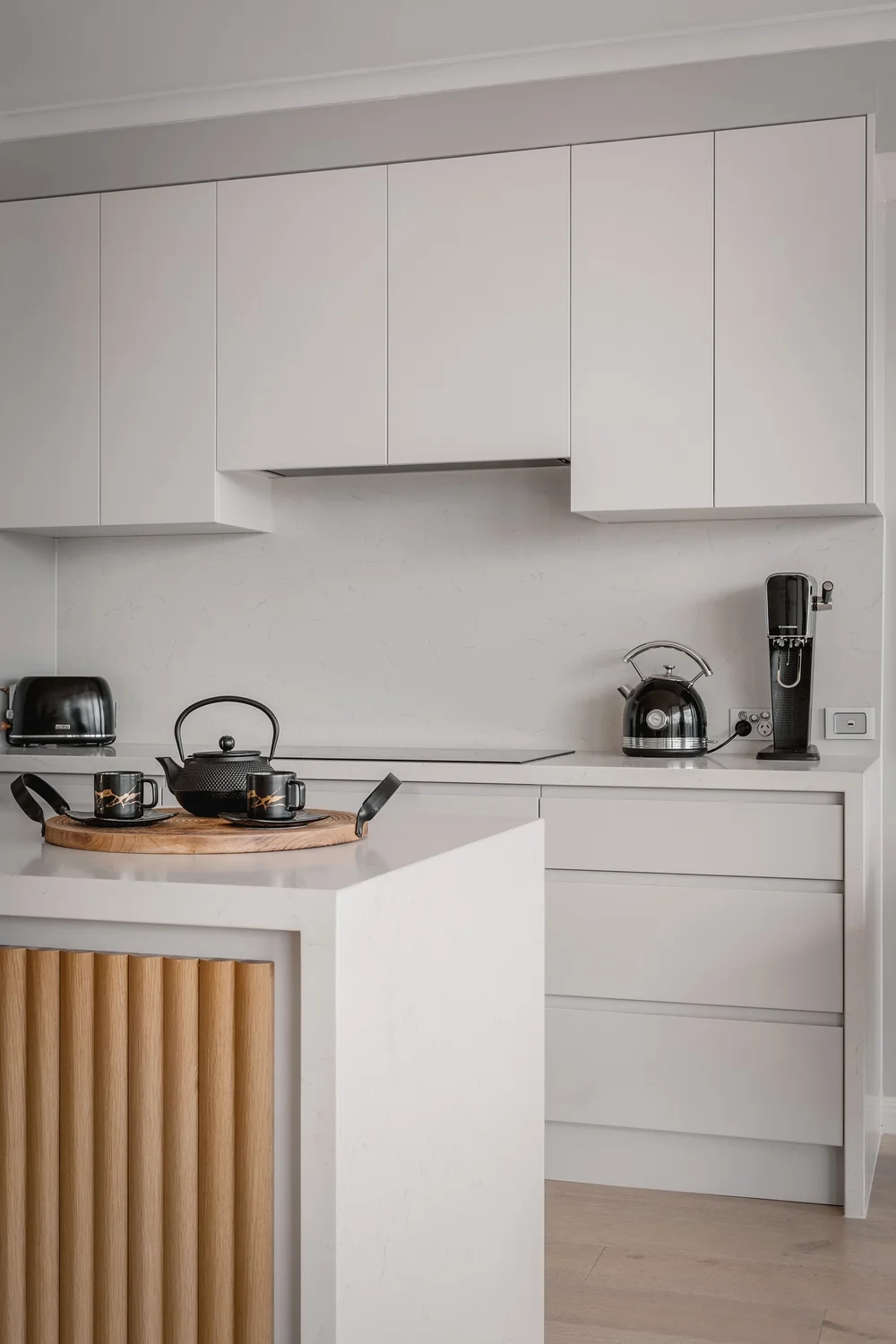 Modern Minimal Kitchen with white cabinetry and Kitchen Island with ...