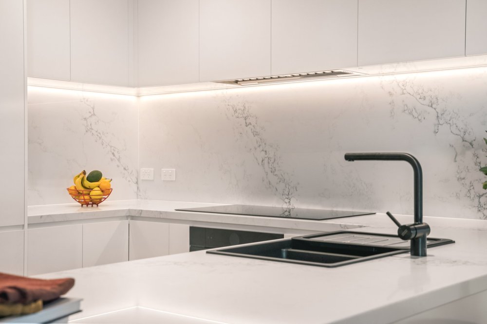 MILLS | Minimal white galley kitchen with acrylic benchtops | Smith & Smith