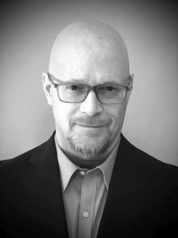 About Us — The Department of Midnight