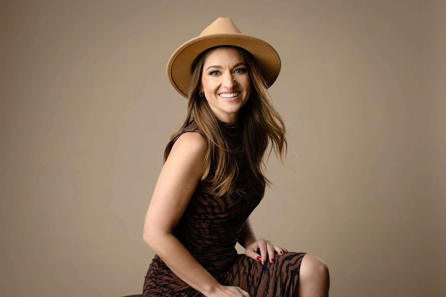 ABOUT — CHRISTIE LORENTZ