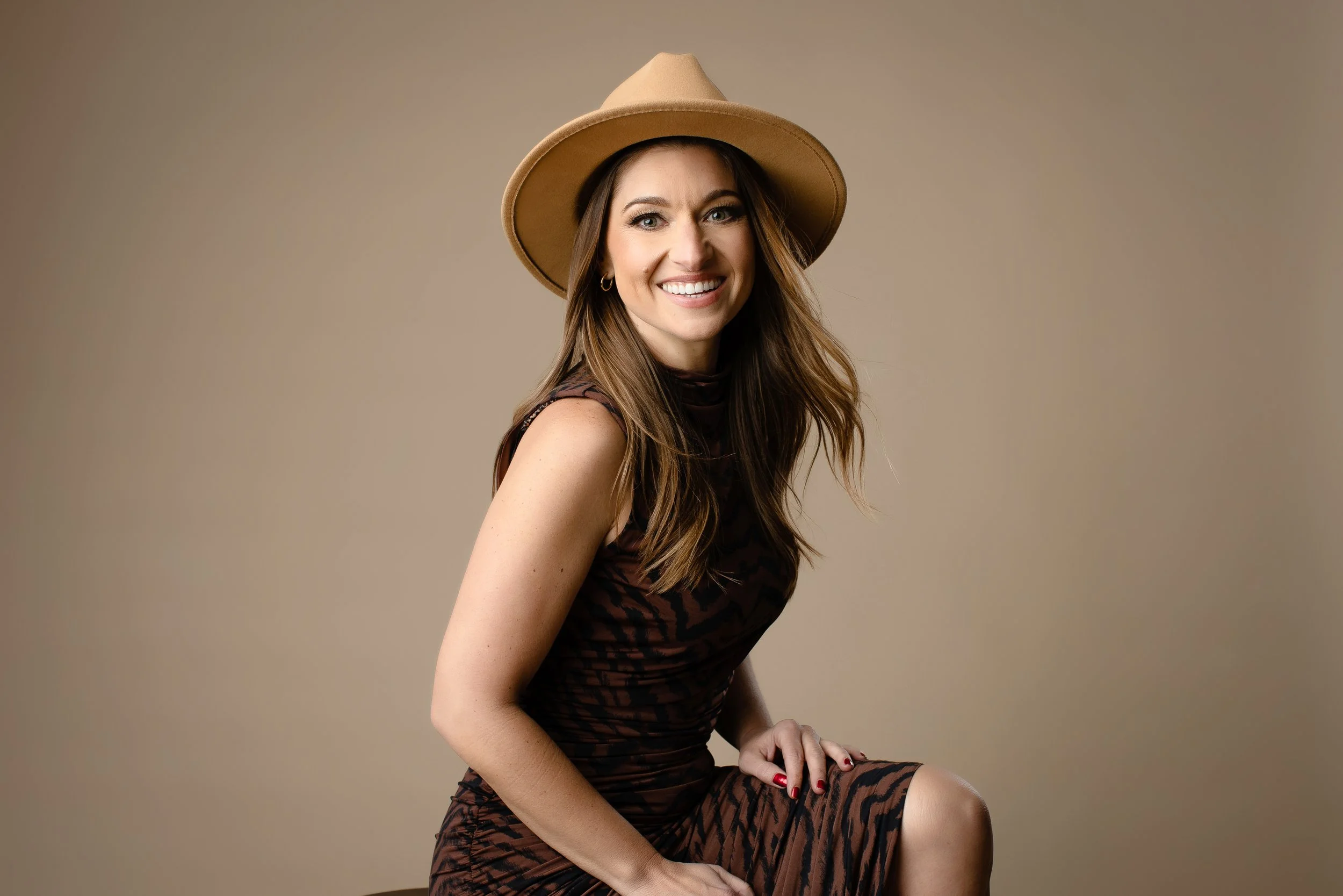 ABOUT — CHRISTIE LORENTZ