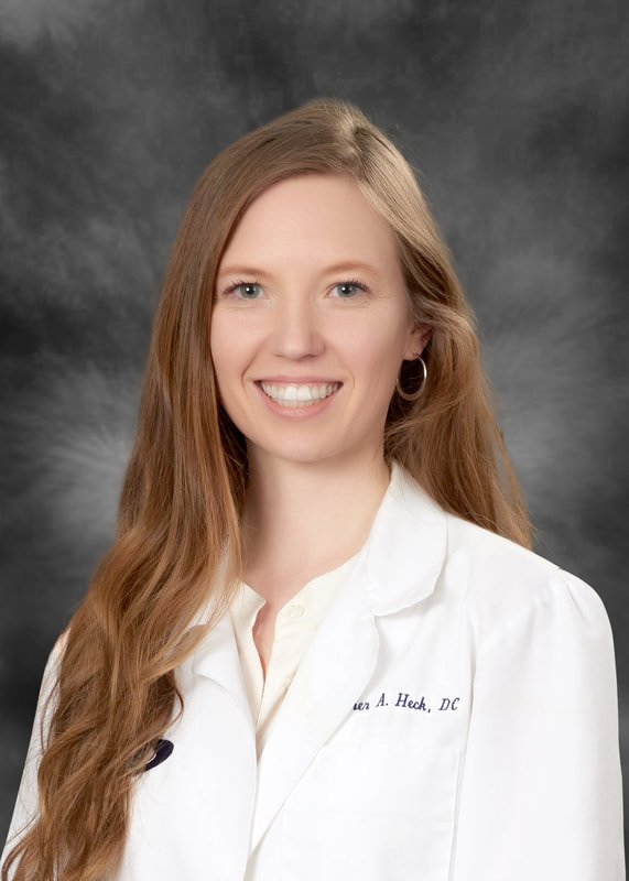 ABOUT DR. HEATHER HECK — Dr. Heather Heck