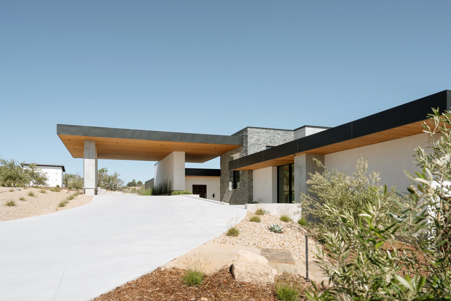 CONTEMPORARY HILLSIDE — HONEYCOMB HOME DESIGN
