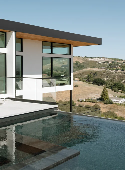 CONTEMPORARY HILLSIDE — HONEYCOMB HOME DESIGN