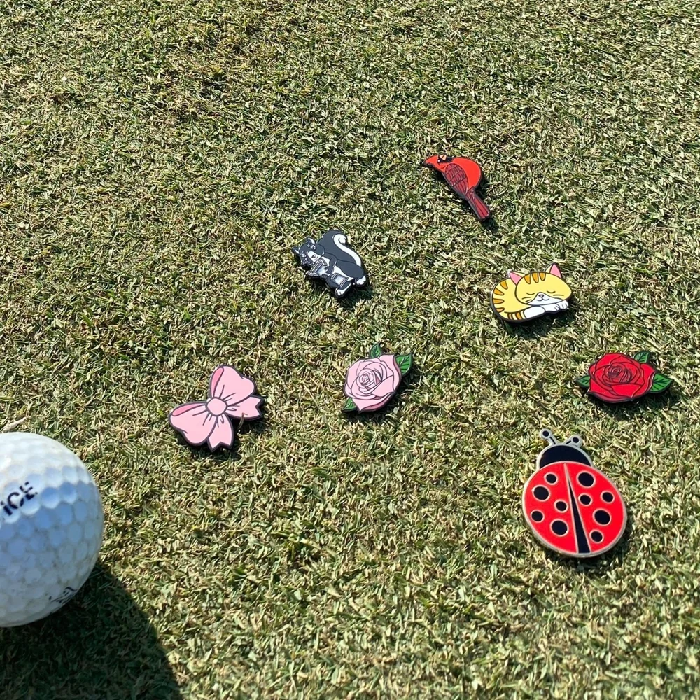 fun golf ball markers — Sit! Ball Markers