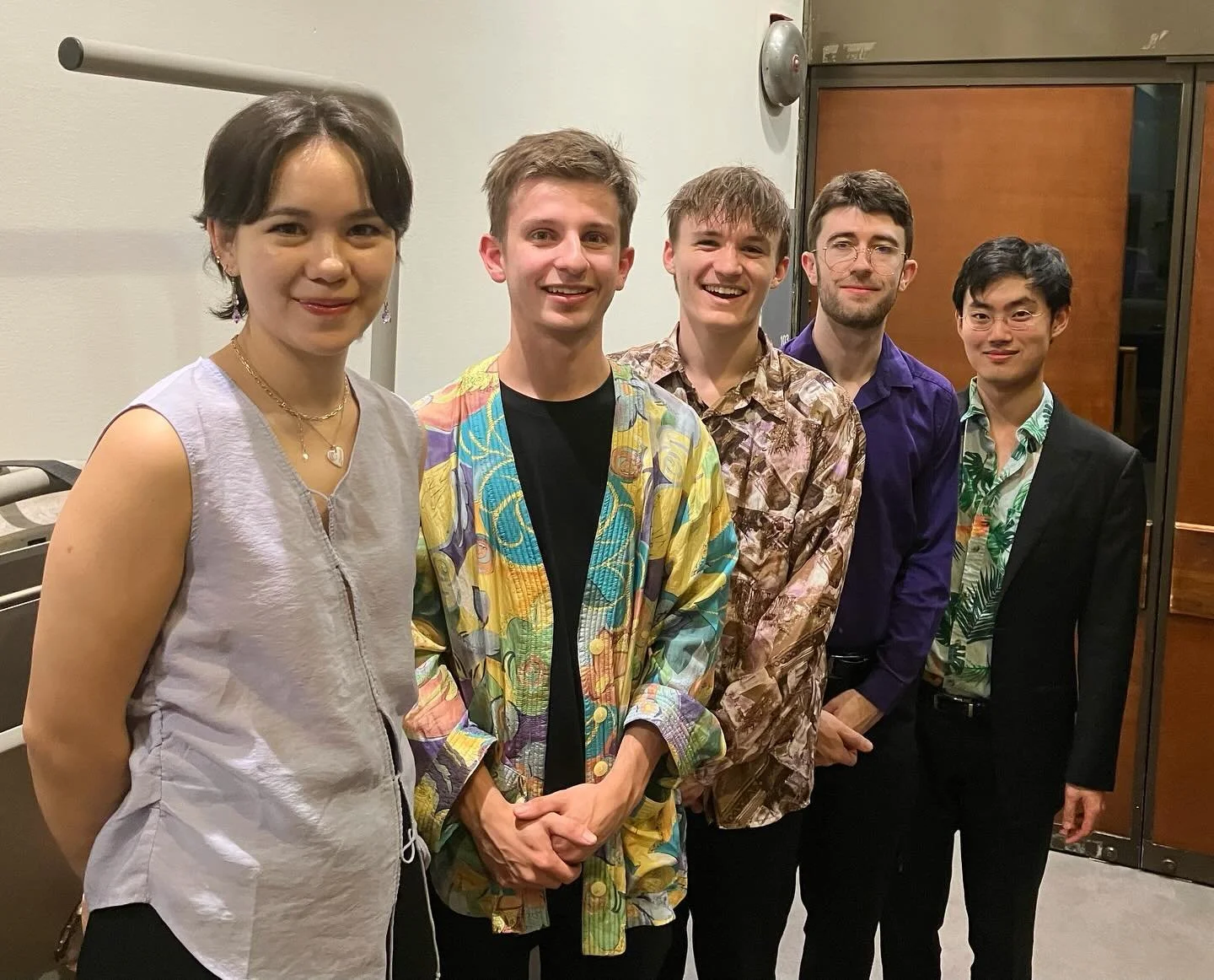 Biography — The Dolphins Quartet