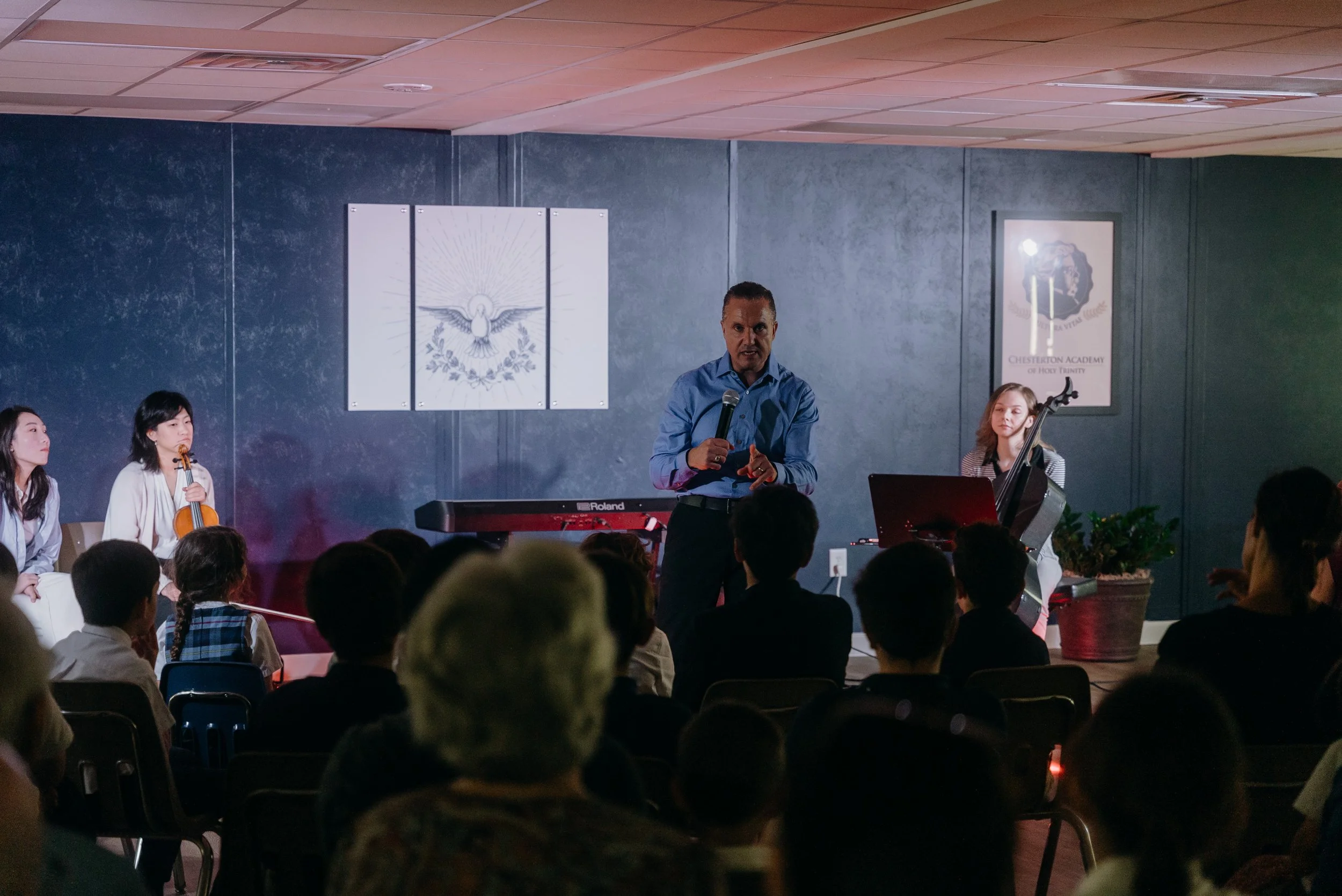 Eric Genuis Concert inspires our students and families — Holy Trinity ...