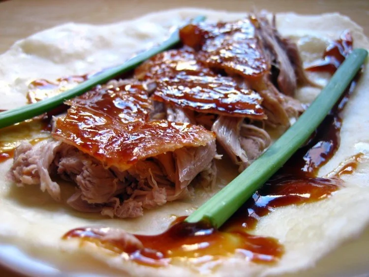 Peking Duck is a famous originating in Beijing, China. Roasted duck has ...