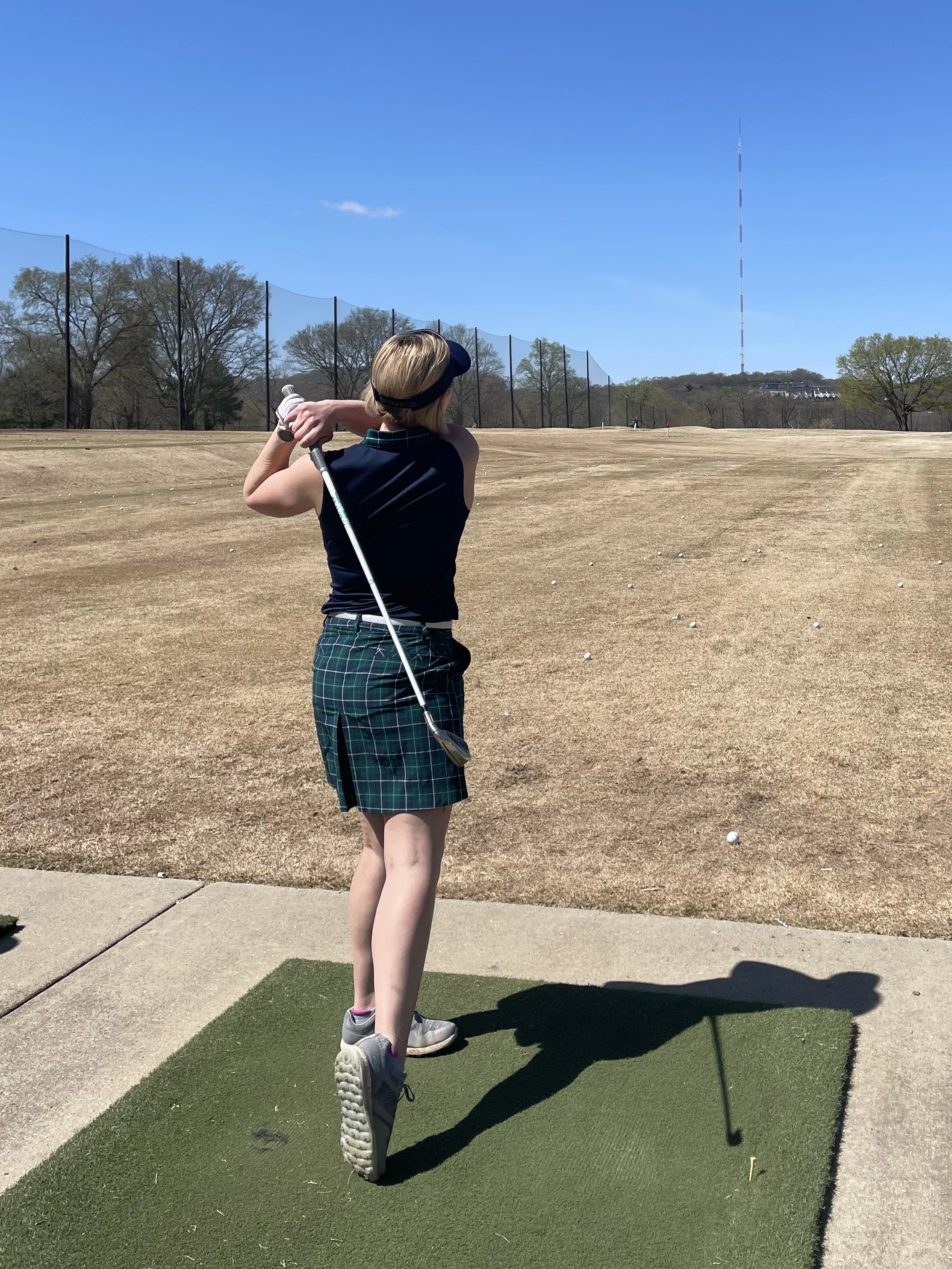 Beginner women's golf driving range guide & practice plan