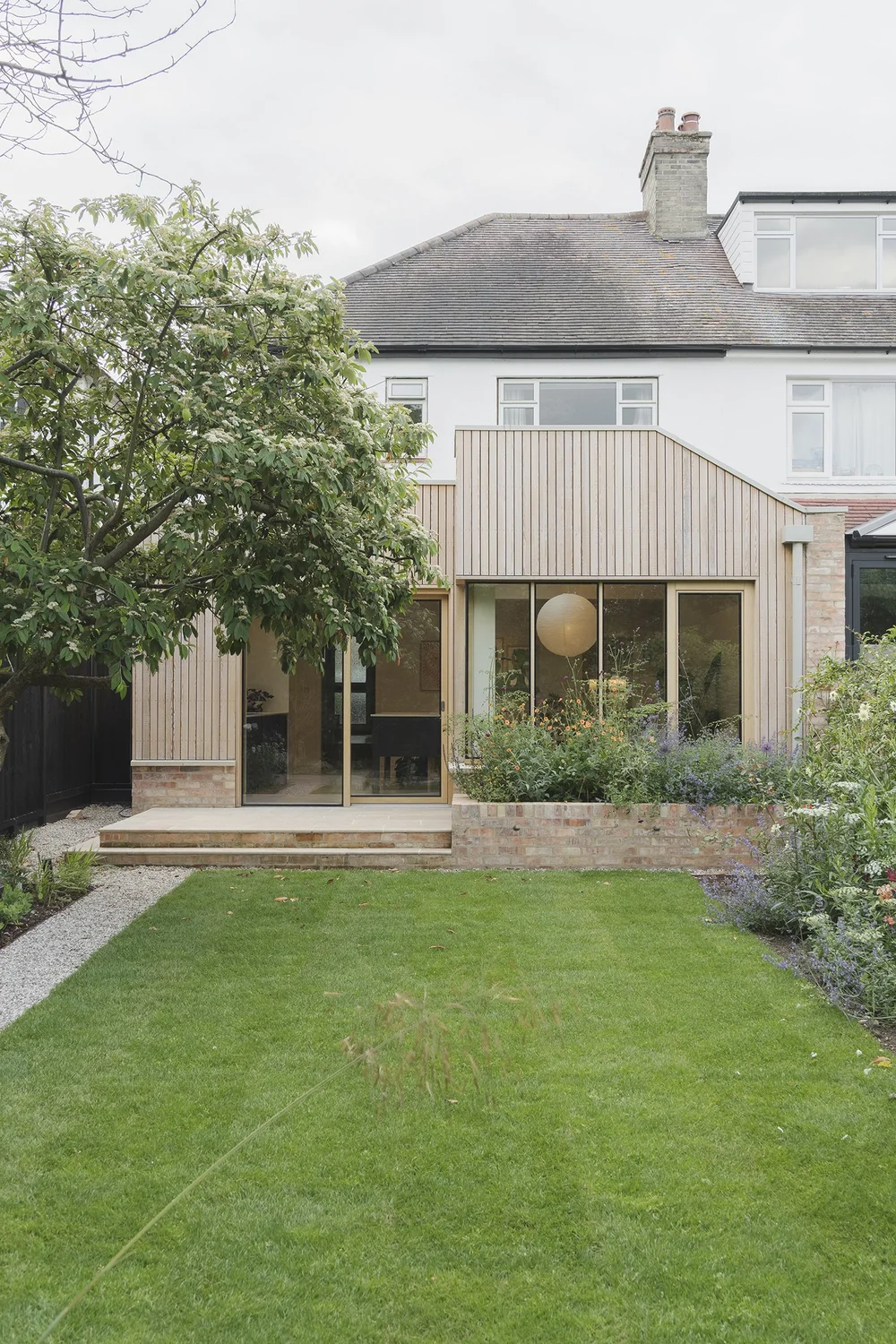 Larch-clad rear extension in the Wanstead Grove Conservation Area ...