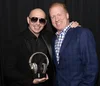 Garth Brooks and Pitbull Receive Custom Awards | Custom Awards and ...