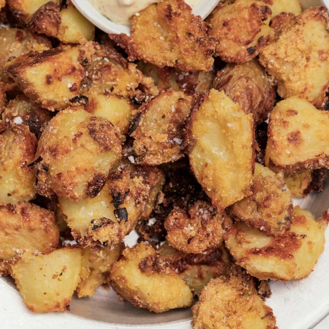 Cheesy Garlic Polenta Potato Chunks Recipe | Two Raw Sisters