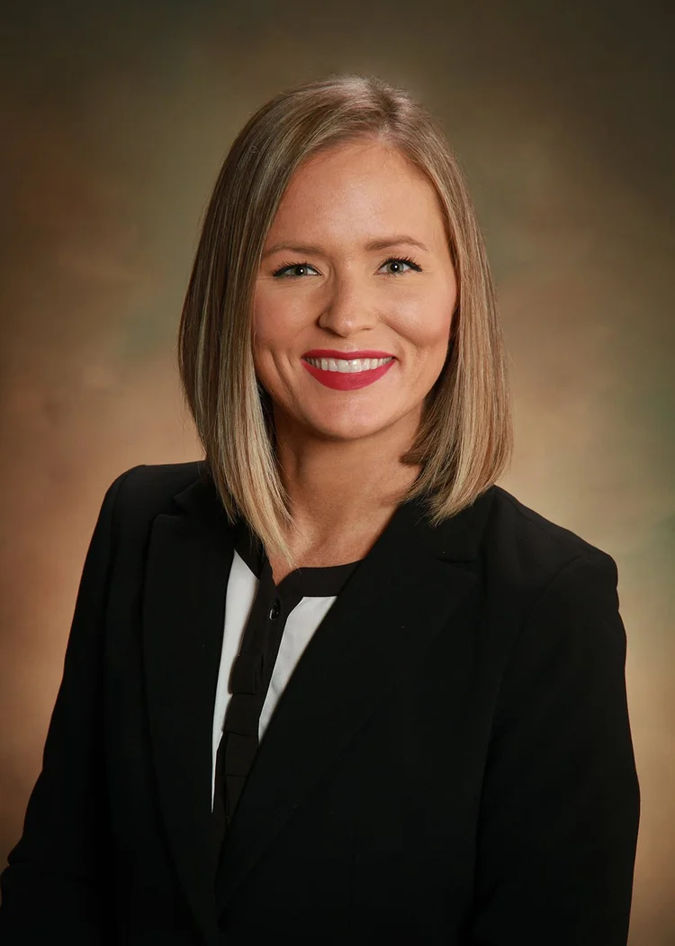 Our Team — Whitney Raque, Esq.