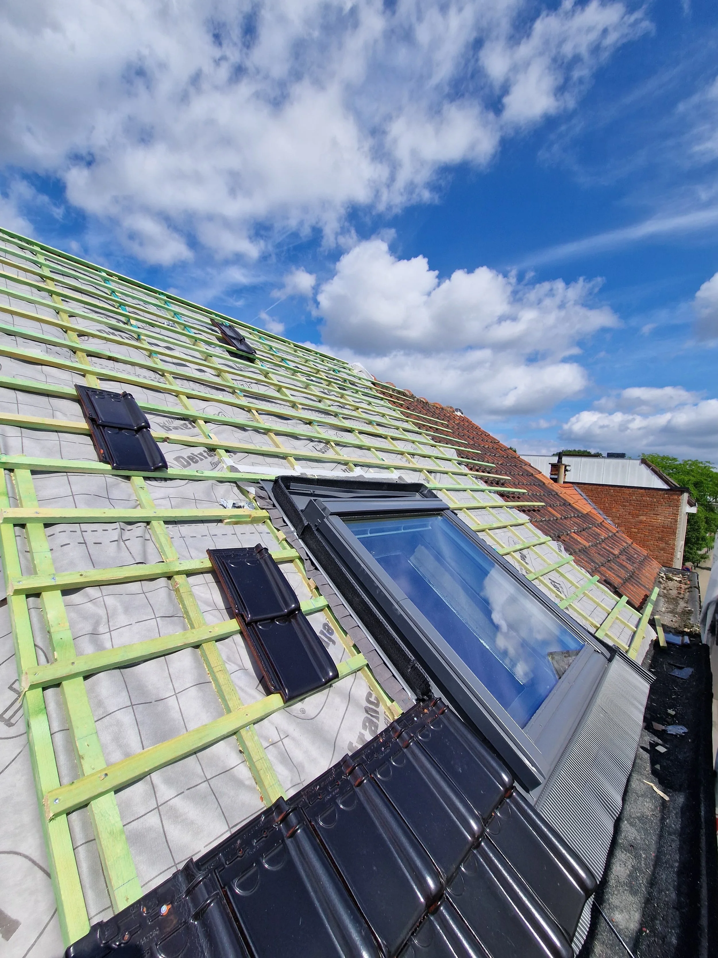 Experts in gevelisolatie, crepi, dakwerken, ramen & deuren - ISOWORKERS