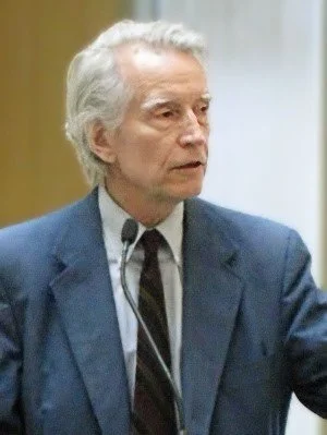 About Robert Holmes — Robert L. Holmes