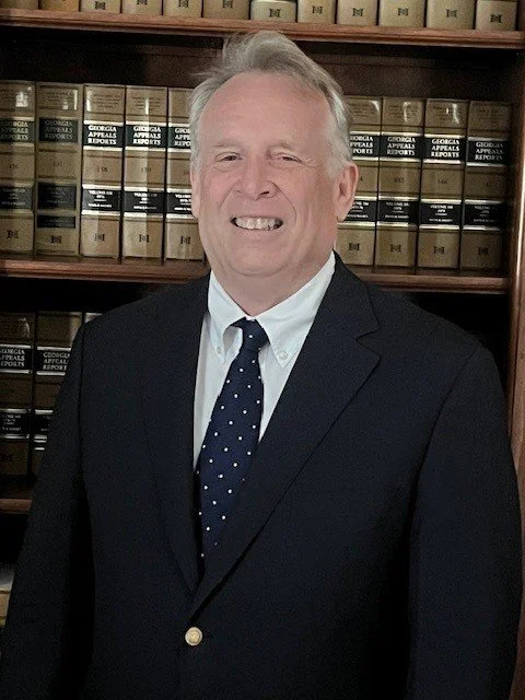 Taz Taylor — Lister, Holt & Dennis Law Firm