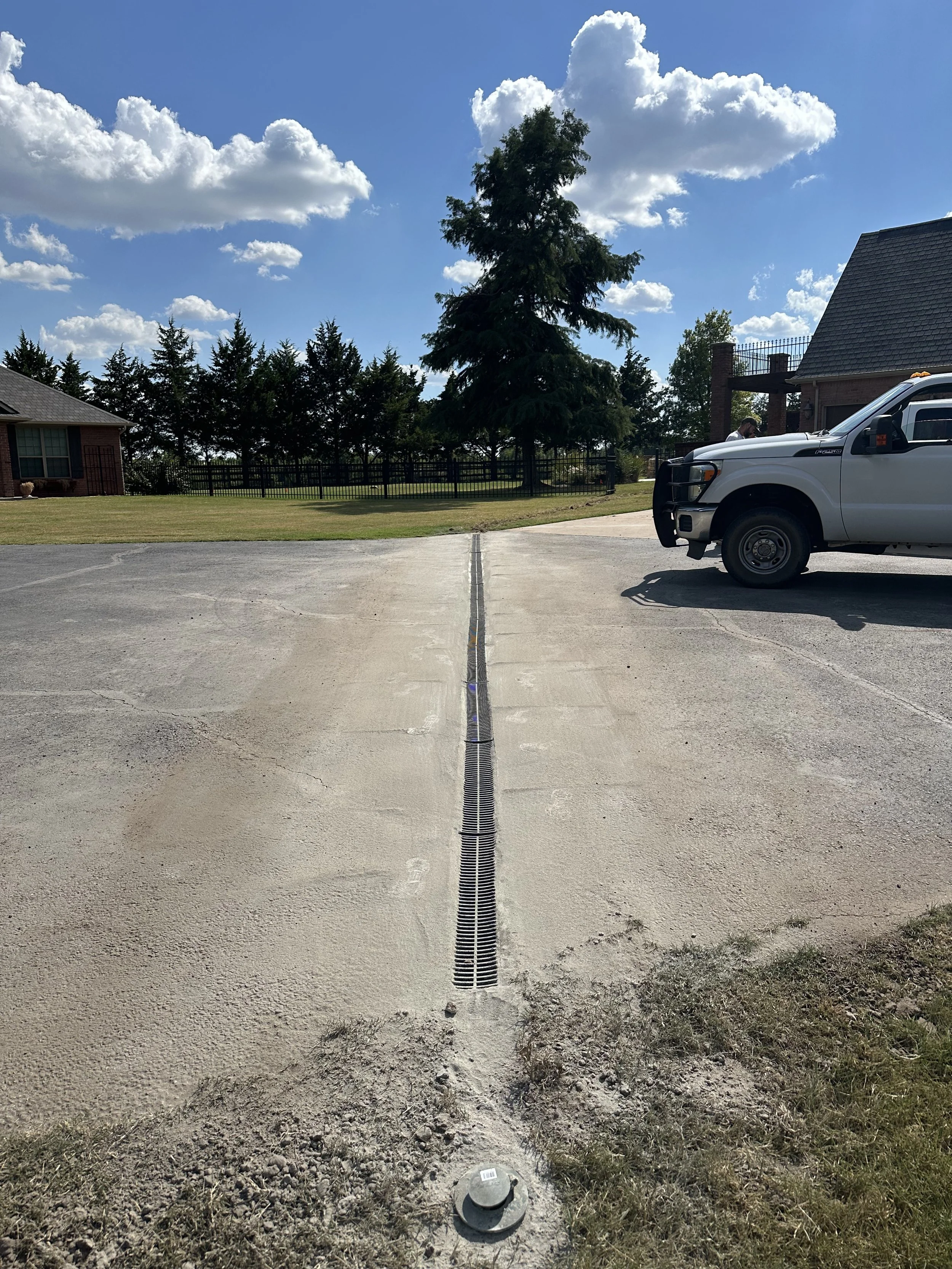 Surface Drain Installation in Oklahoma | OK Custom Drainage Solutions ...
