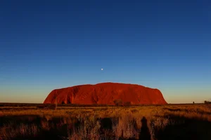 Uluru’s Sacred Resonance: Indigenous Voices & the Tourist Spotlight