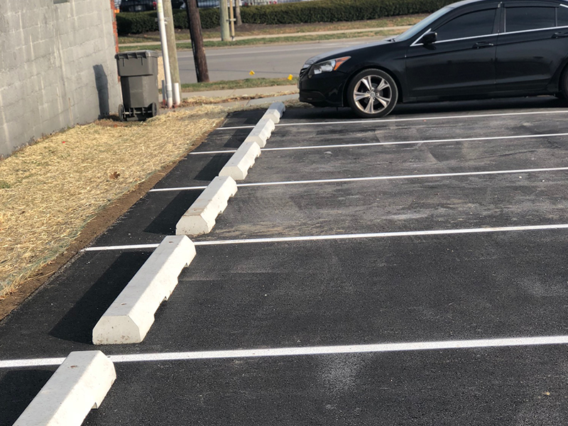 Wheel Stops Installation in Central Texas — AccuStripe Paving and ...
