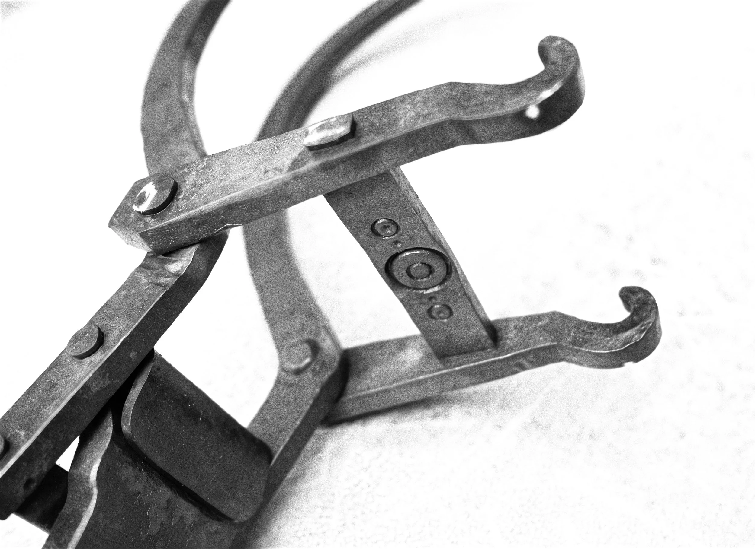Traditionally forged crossbow loading device — Sintr Metal Design