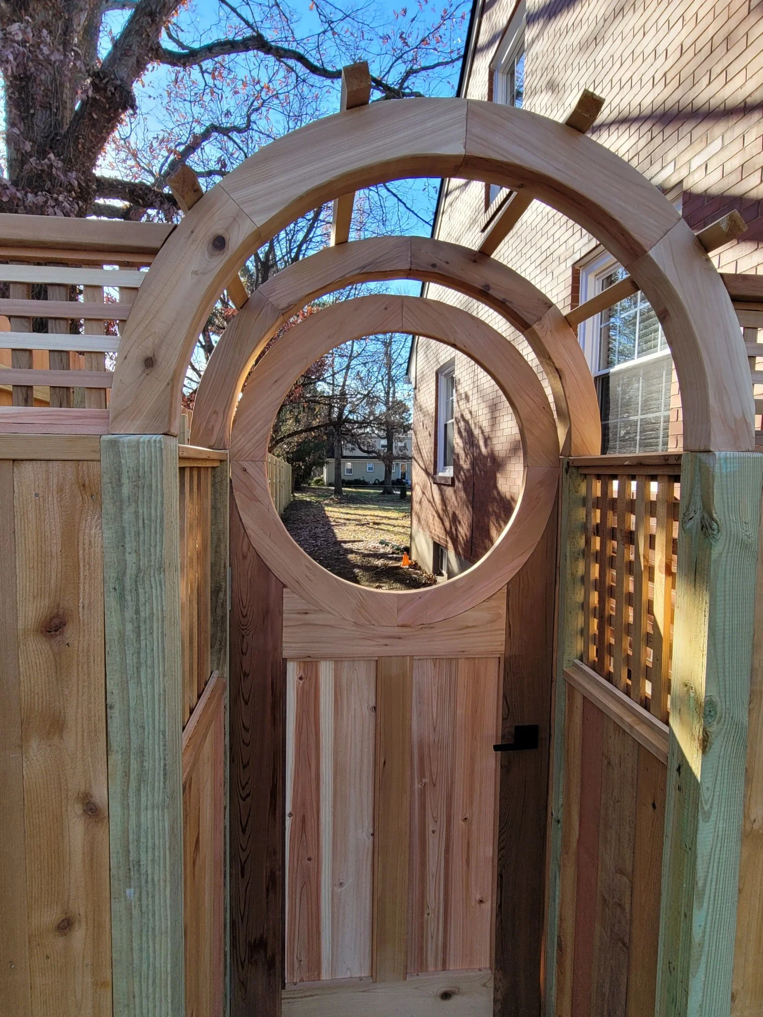 Moon Gate | A Handcrafted Wooden Gate & Privacy Fence — The Fence Guy ...