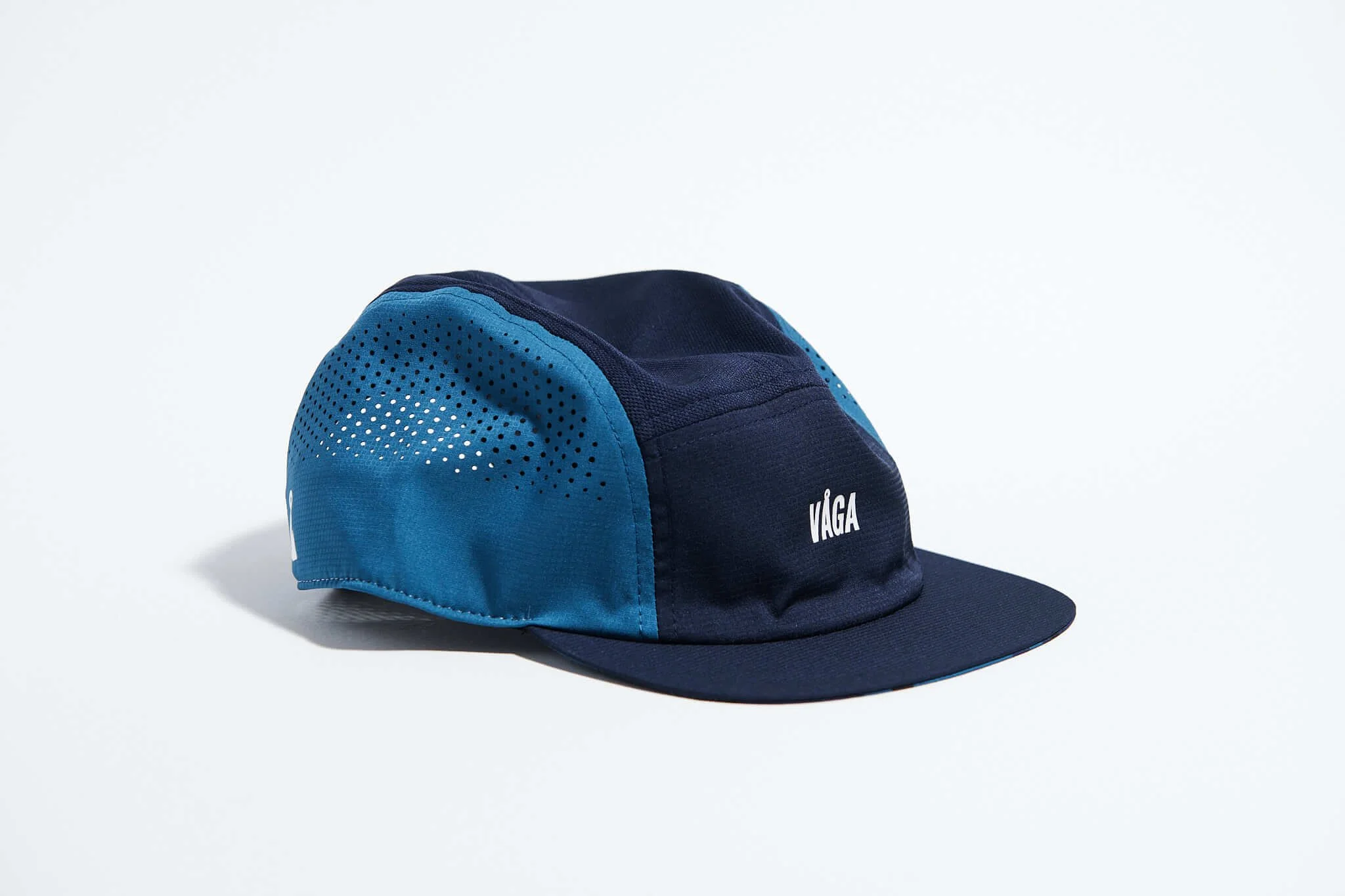 Shop Feather Racing Cap in Teal / Navy Blue | VÅGA EU