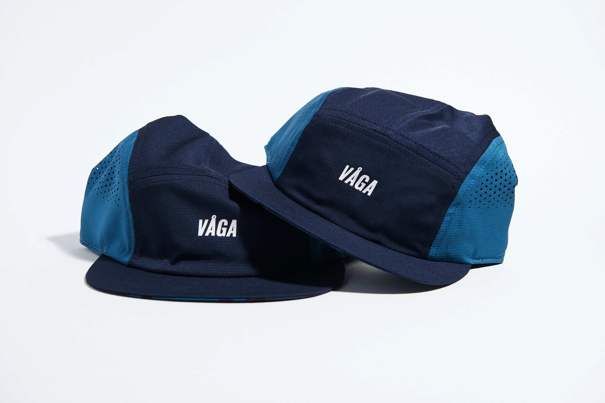 Shop Feather Racing Cap in Teal / Navy Blue | VÅGA EU