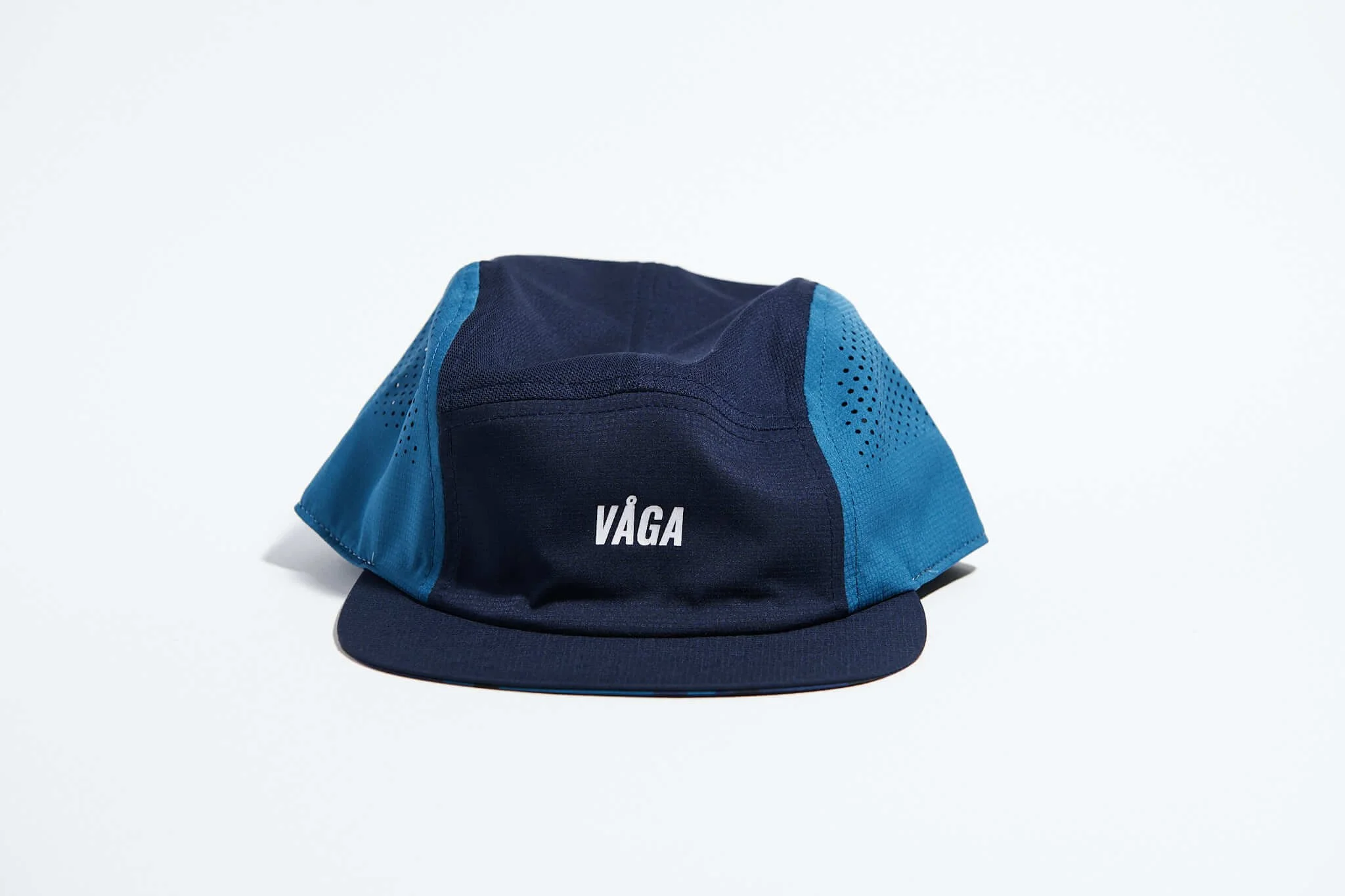 Shop Feather Racing Cap in Teal / Navy Blue | VÅGA EU