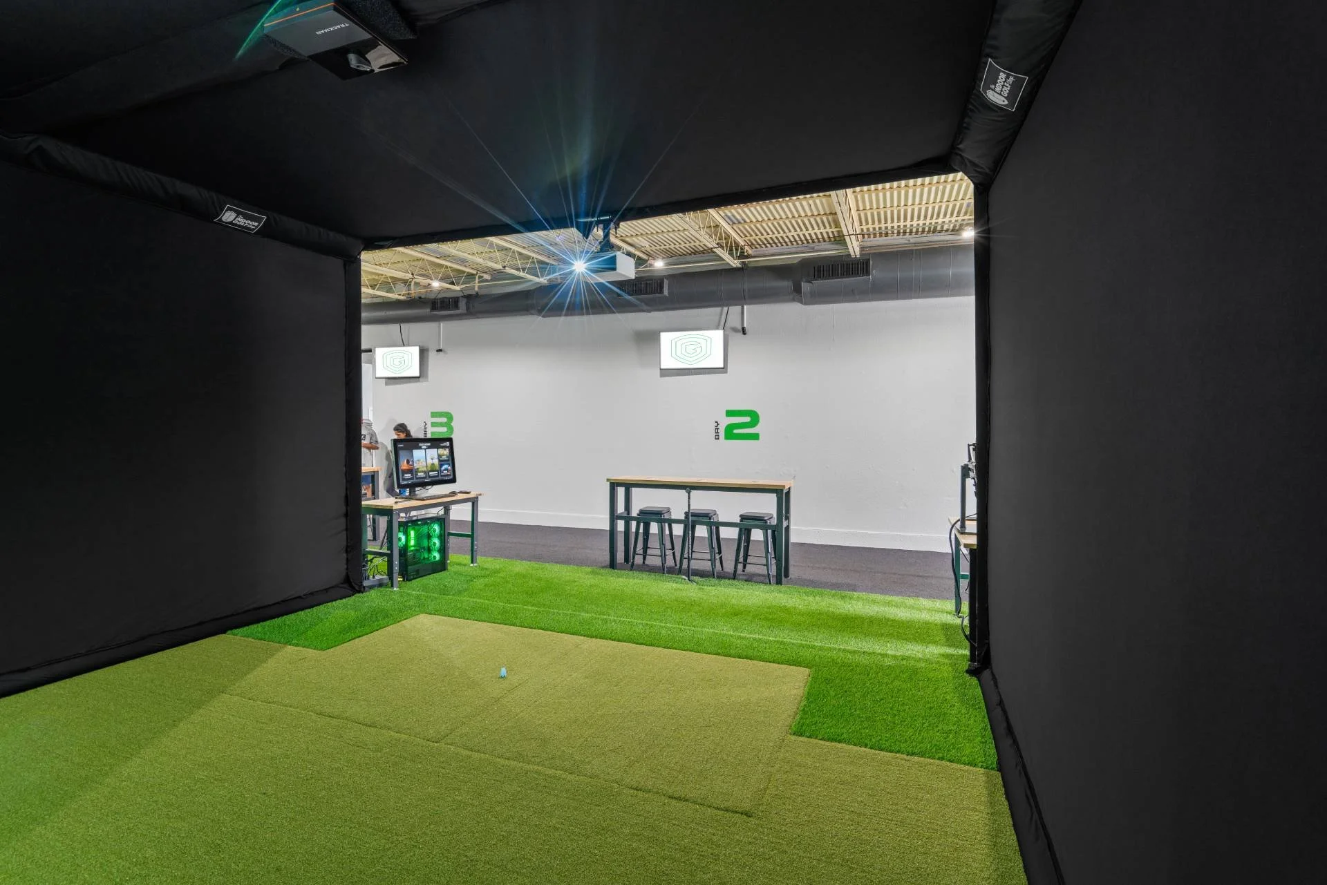 golf simulator lounge, golf lessons and indoor golf — Golf Spot