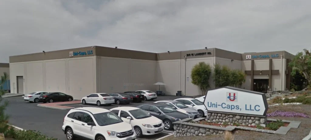 Company — Uni-Caps, LLC