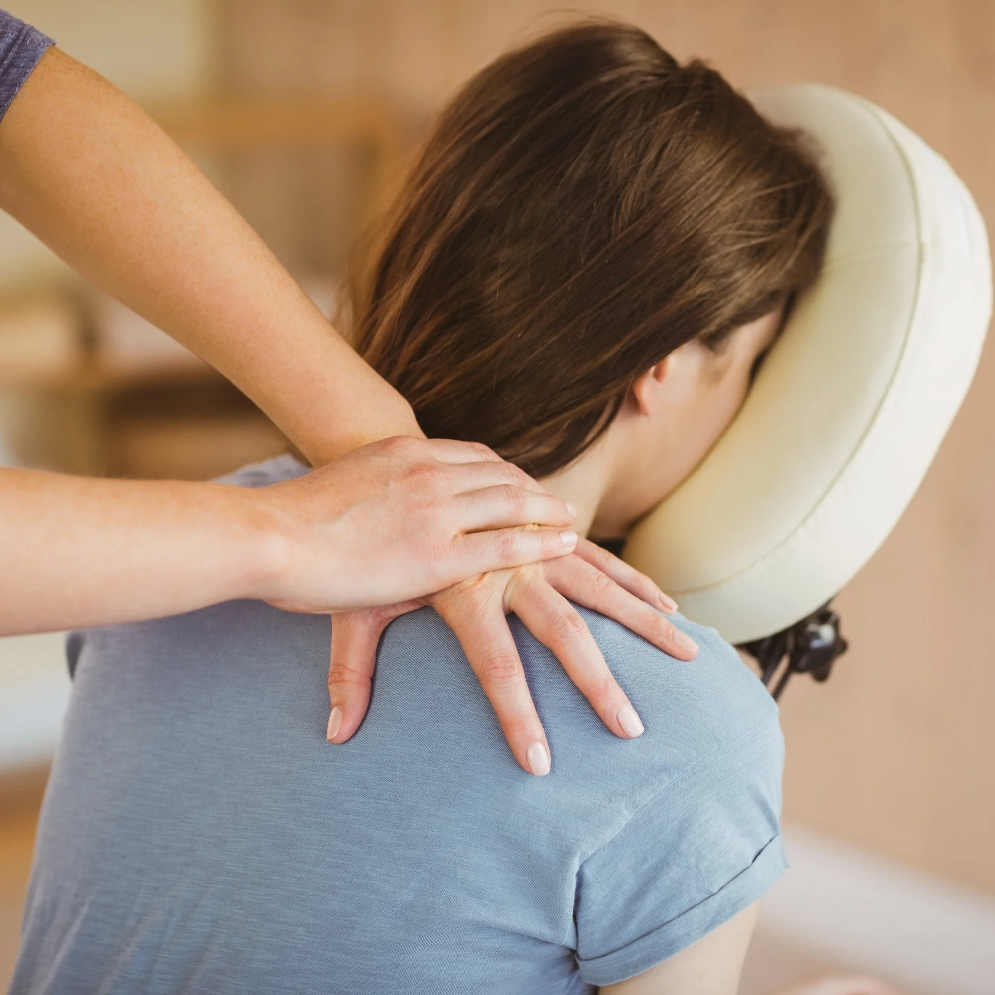 The Benefits of Chair Massages: Improving Health and Happiness at Work ...