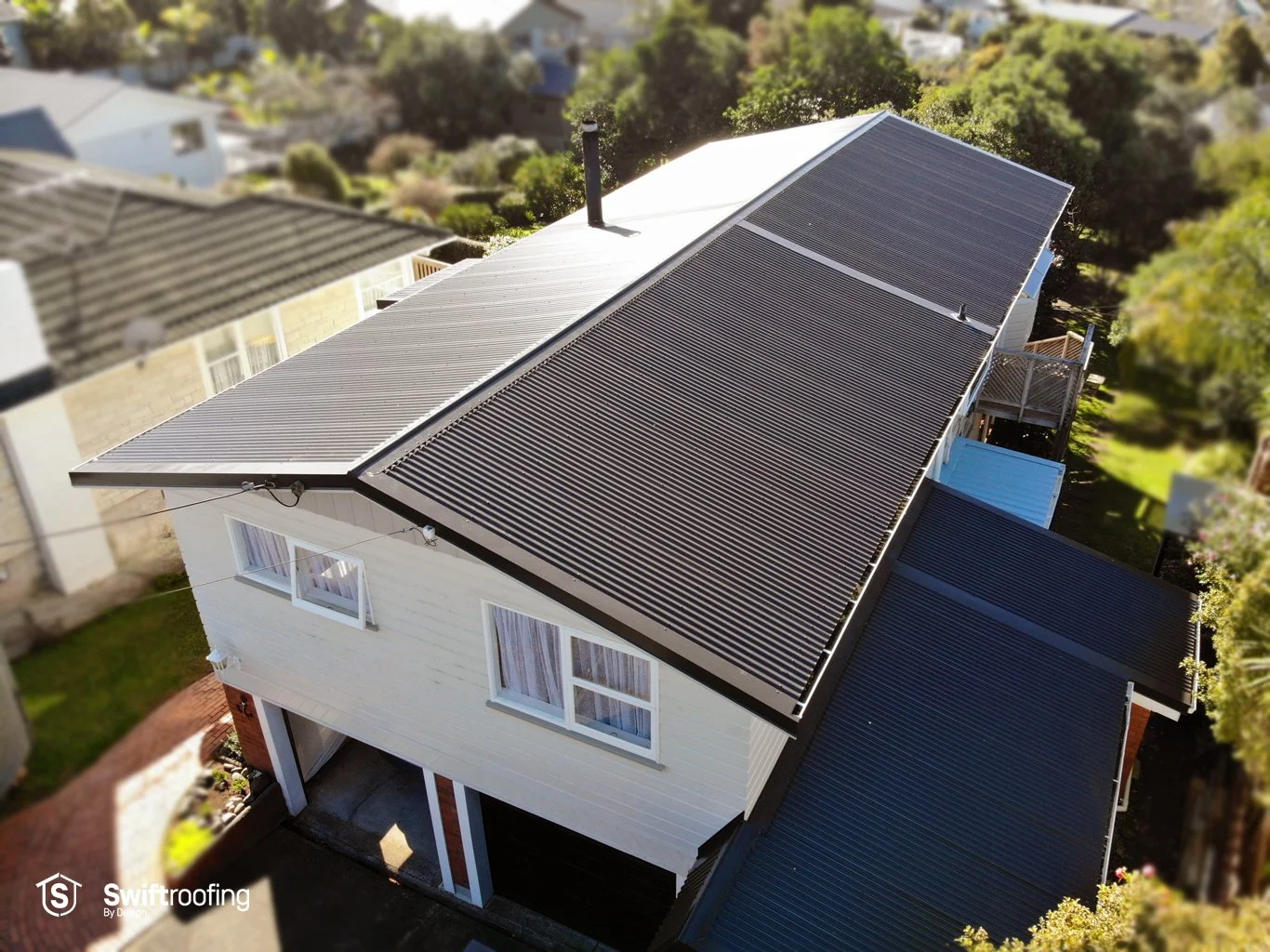 Swift Roofing removes two layers of roofing (double strip) & re-roofs ...