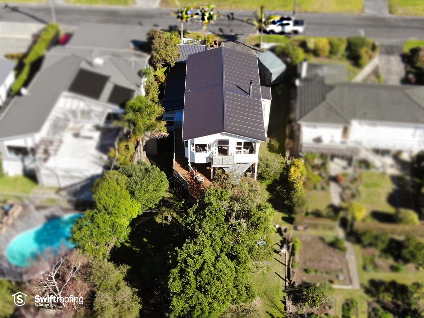 Swift Roofing removes two layers of roofing (double strip) & re-roofs ...