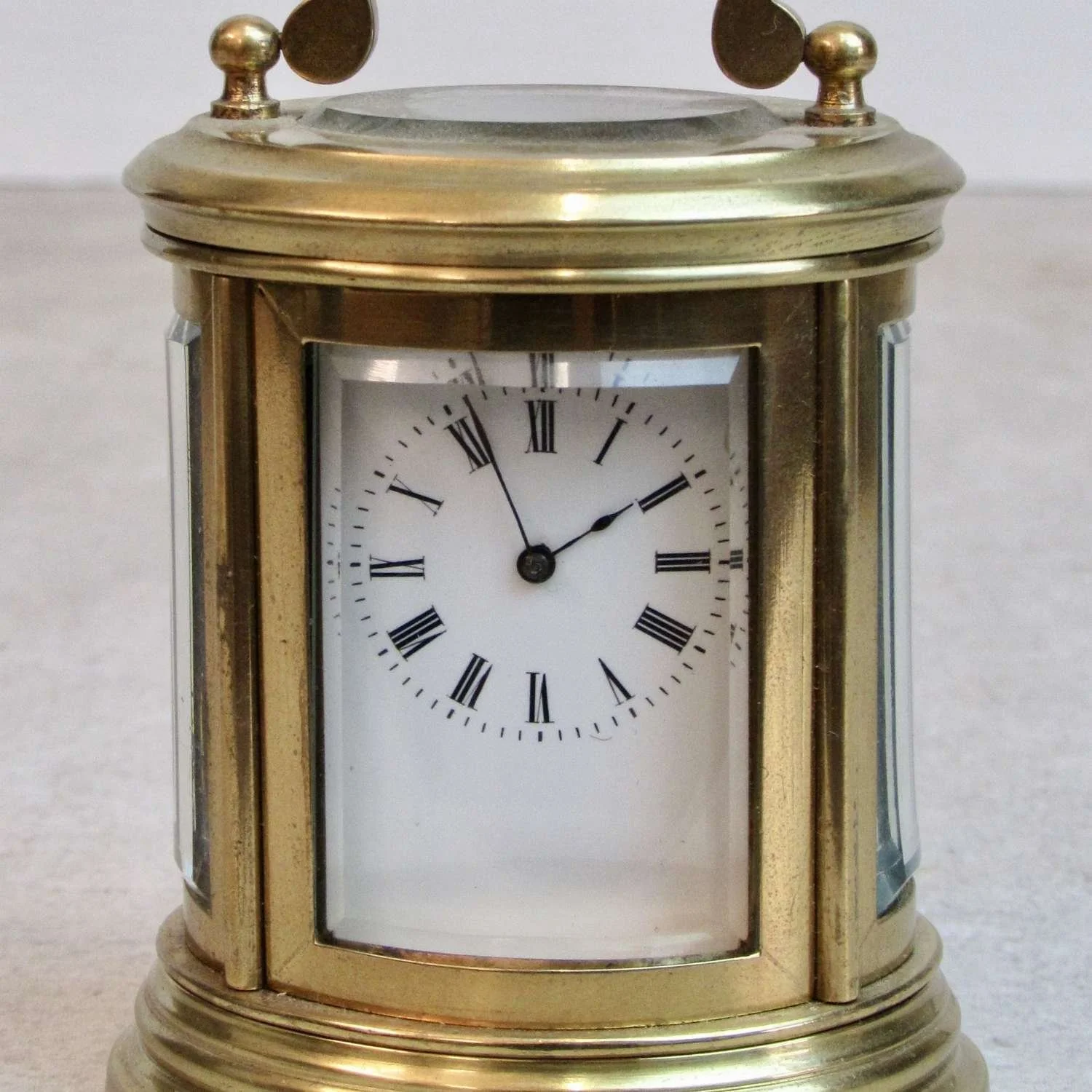 Miniature oval French carriage clock. — Ascot Antique Clocks