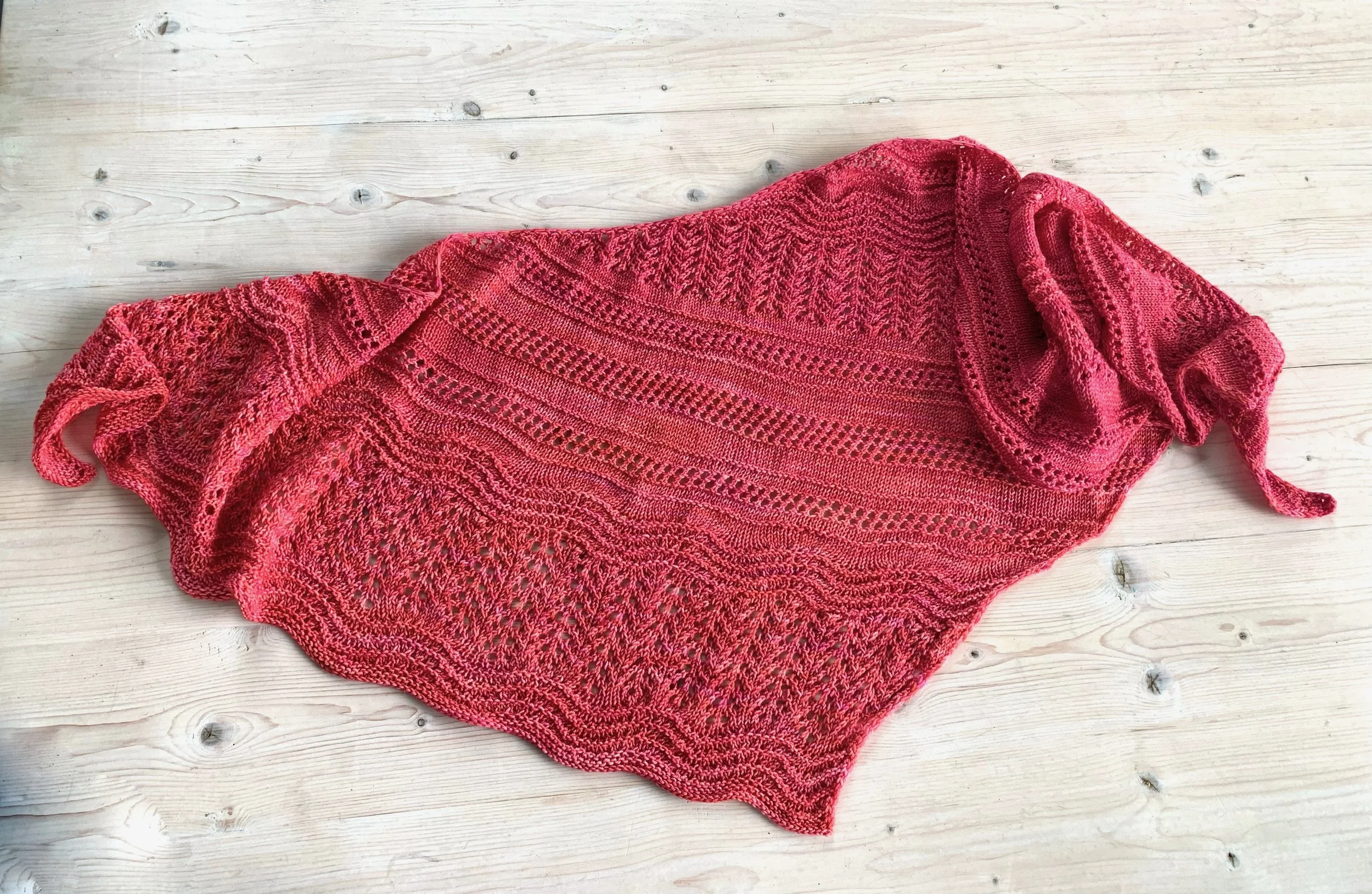 Lace shawl knitting pattern that uses easy yarn over stitches to evoke ...