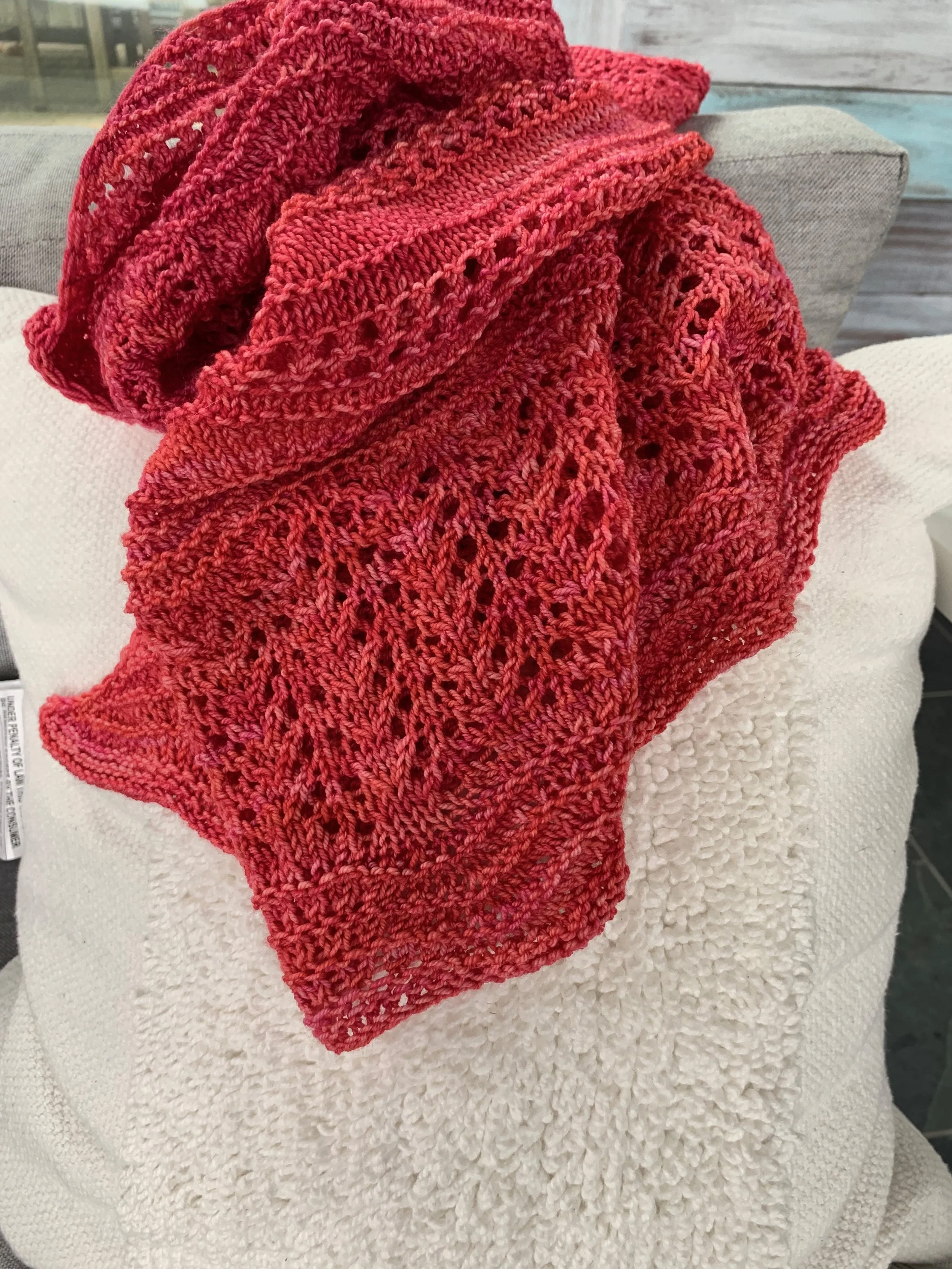Lace shawl knitting pattern that uses easy yarn over stitches to evoke ...