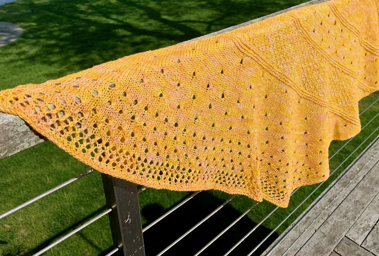 Lace shawl knitting pattern that uses easy yarn over stitches to evoke ...