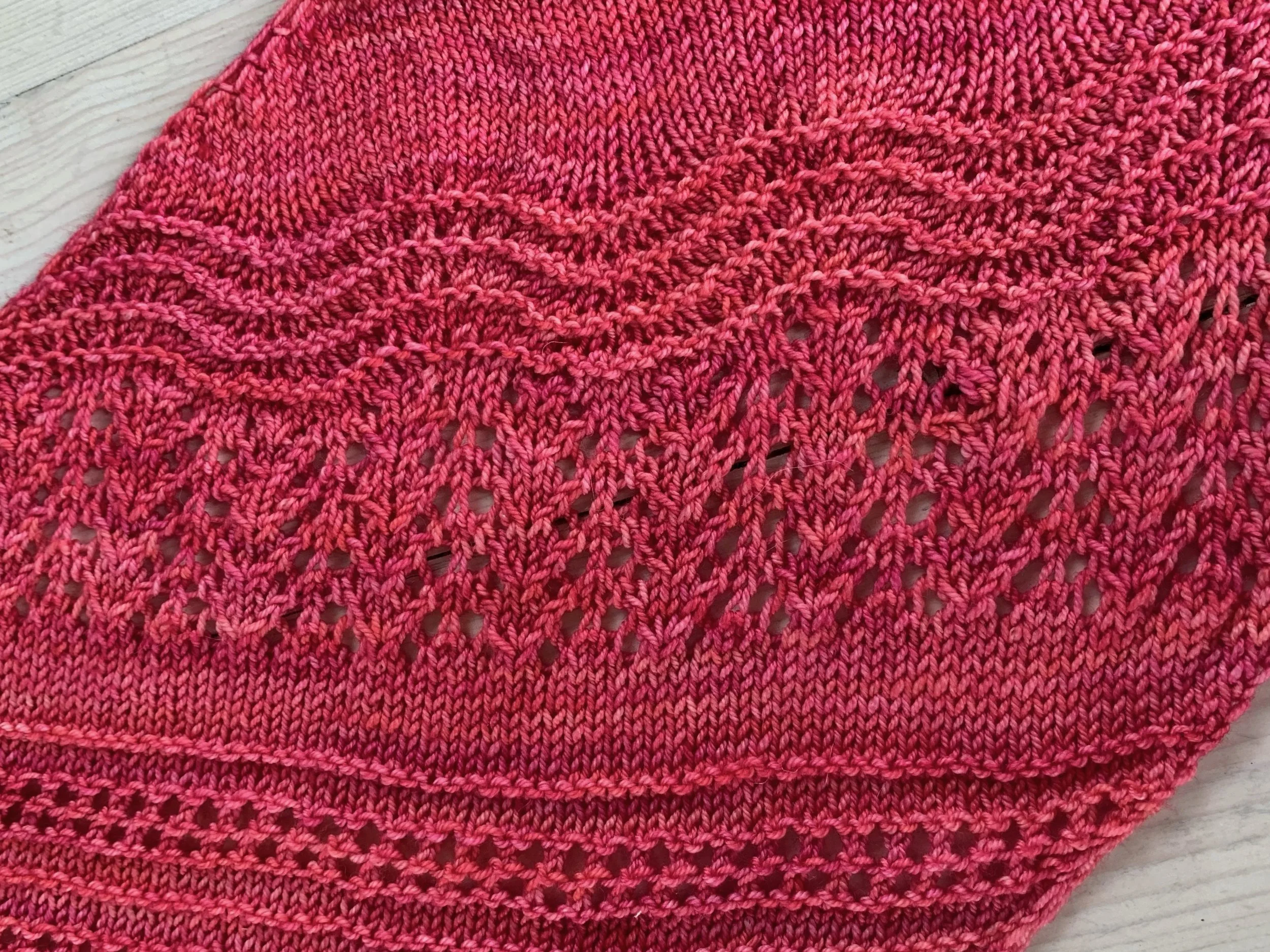 Lace shawl knitting pattern that uses easy yarn over stitches to evoke ...