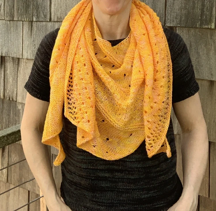Lace shawl knitting pattern that uses easy yarn over stitches to evoke ...
