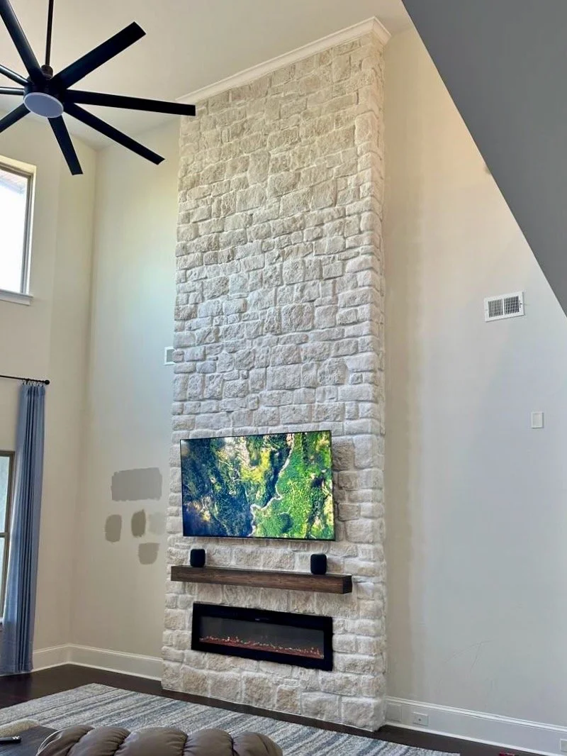 20-Foot Stone Fireplace Media Wall in Winter Garden, FL | Avileve