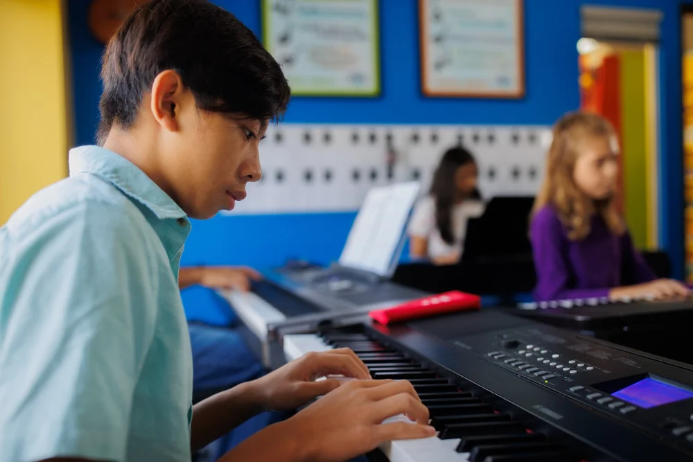 Piano & Guitar Lessons in Des Moines, IA | Arrow Academy of Music